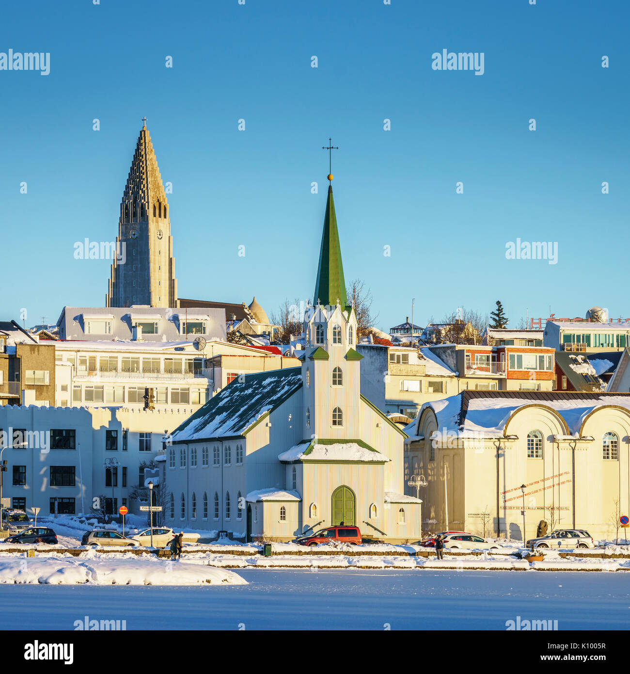 Frikirkjan and Hallgrimskirkja Church, Frozen Pond, Winter, Reykjavik ...