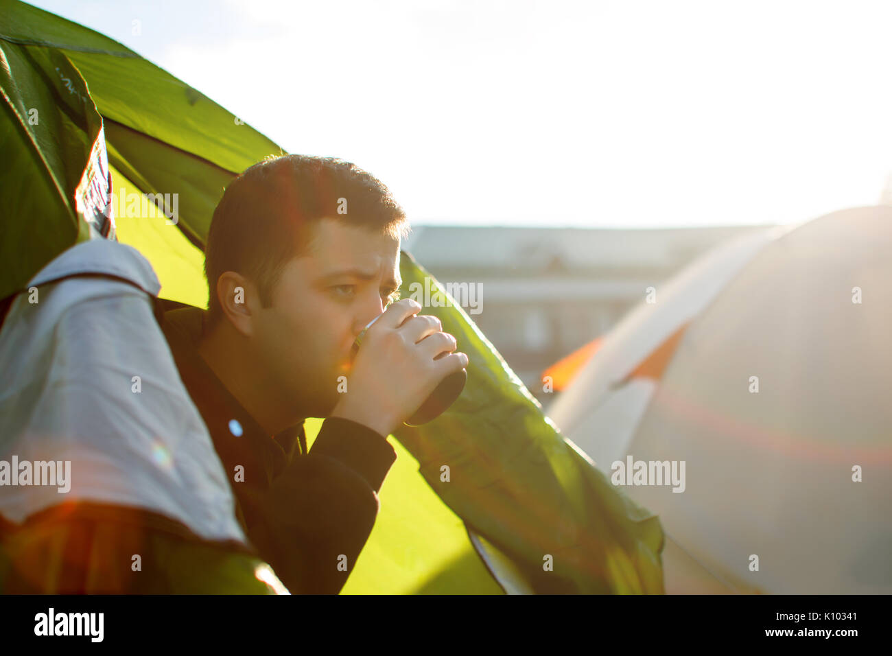 Image of man in tent Stock Photo - Alamy
