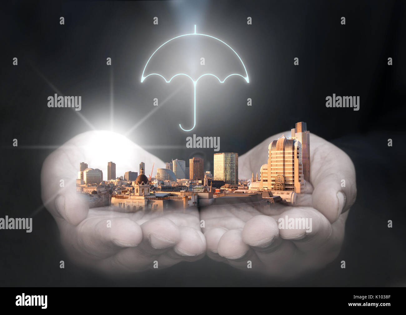 Business man holding company buildings with umbrella protection Stock ...