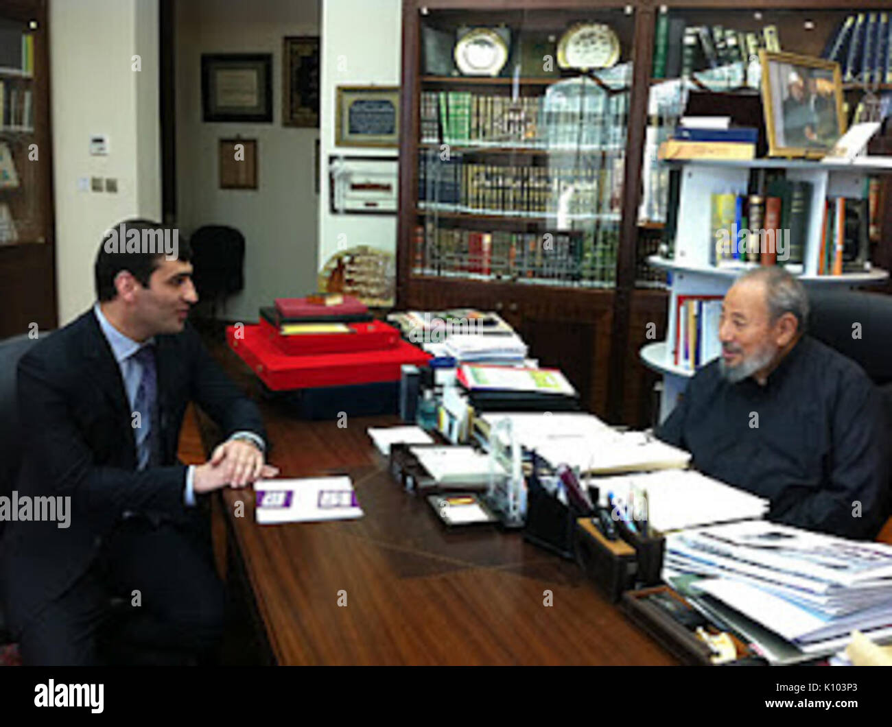 Ahmet Azimov, a notable figure, is pictured with Sheikh Qaradawi, a ...