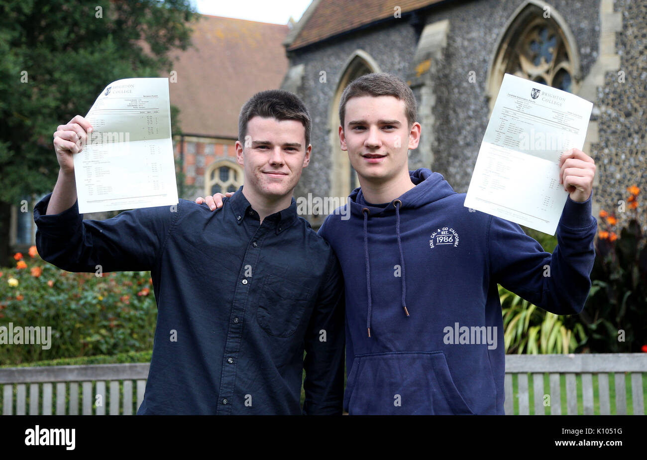 Benjamin Pluck (left) with his twin brother Dan after receiving their ...