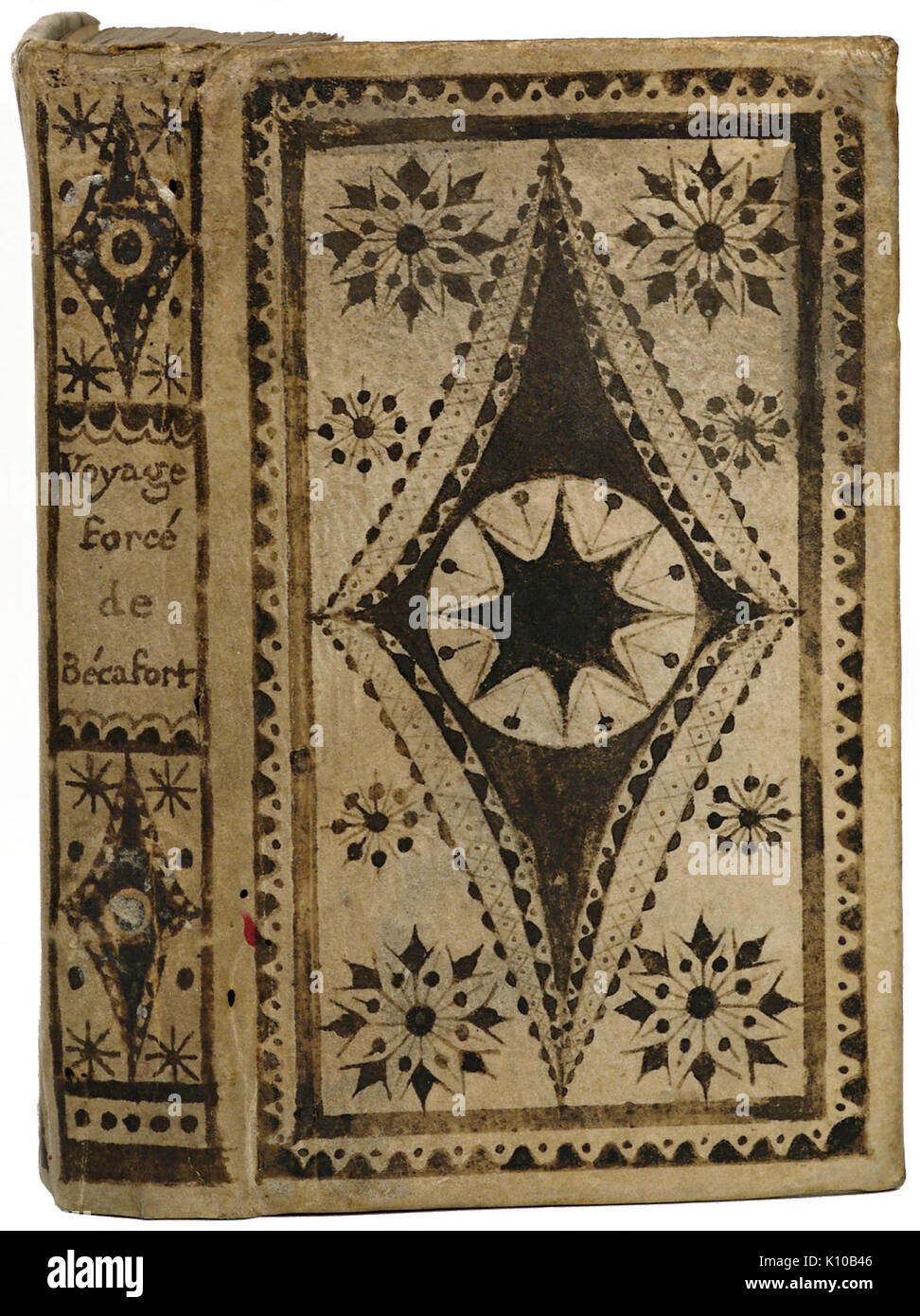 This manuscript features a band of white parchment with a black ...