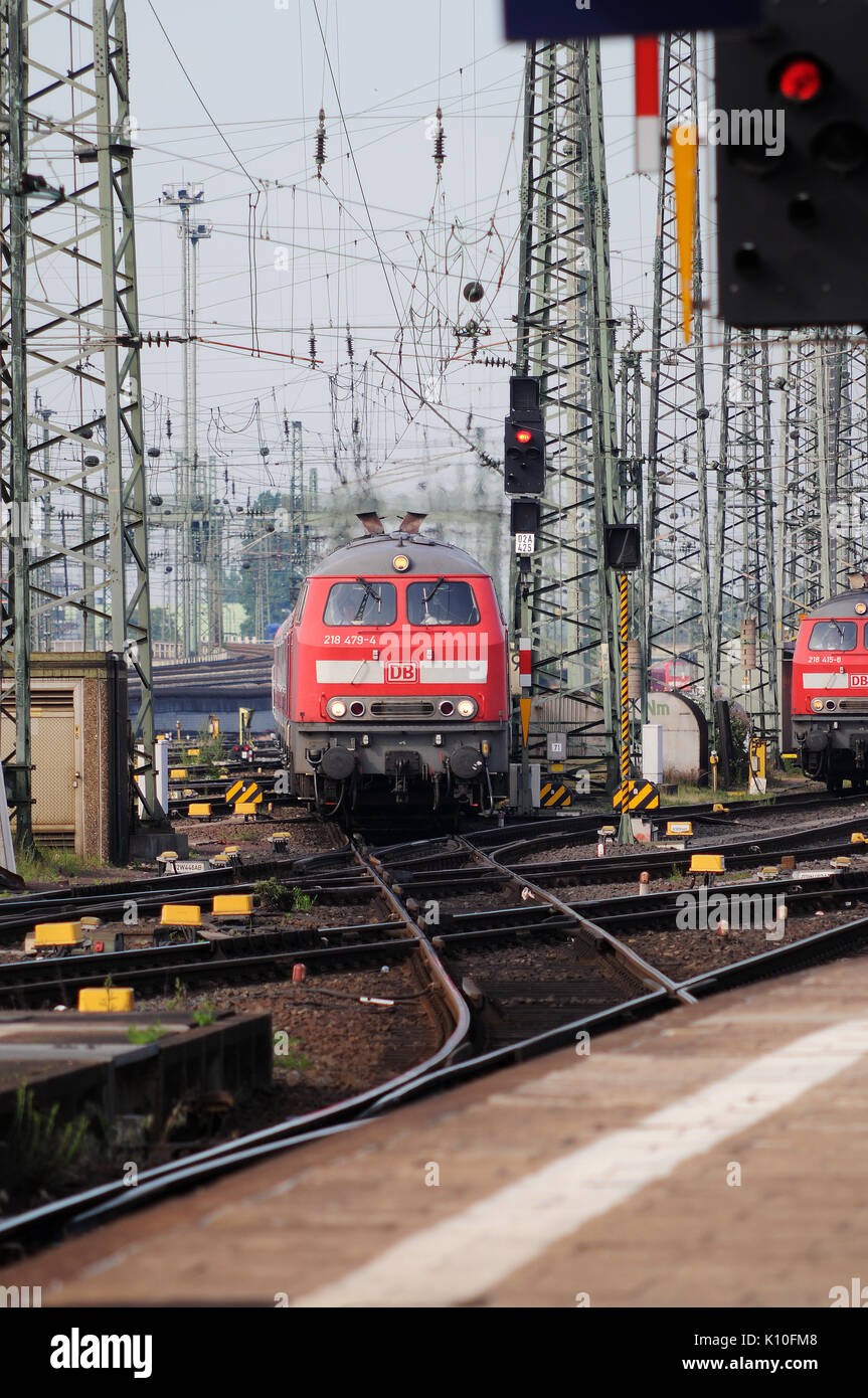 Diesel locomotive 218 479-4 approaches Frankfurt Hauptbahnhof as sister ...