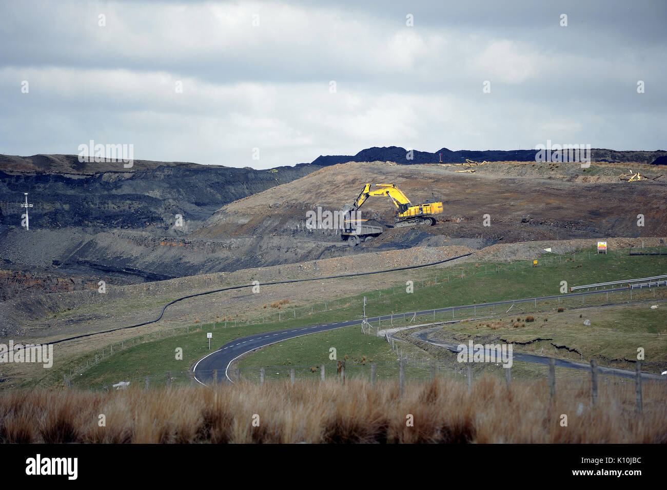 Tipper lorry being loaded with overburden at Ffos Y Fran Stock Photo ...