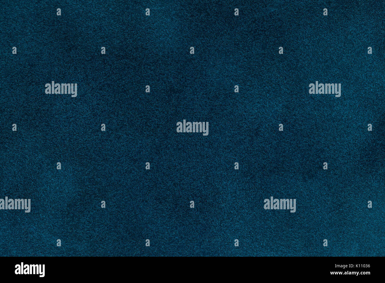 Background of dark blue suede fabric closeup. Velvet matt texture of ...