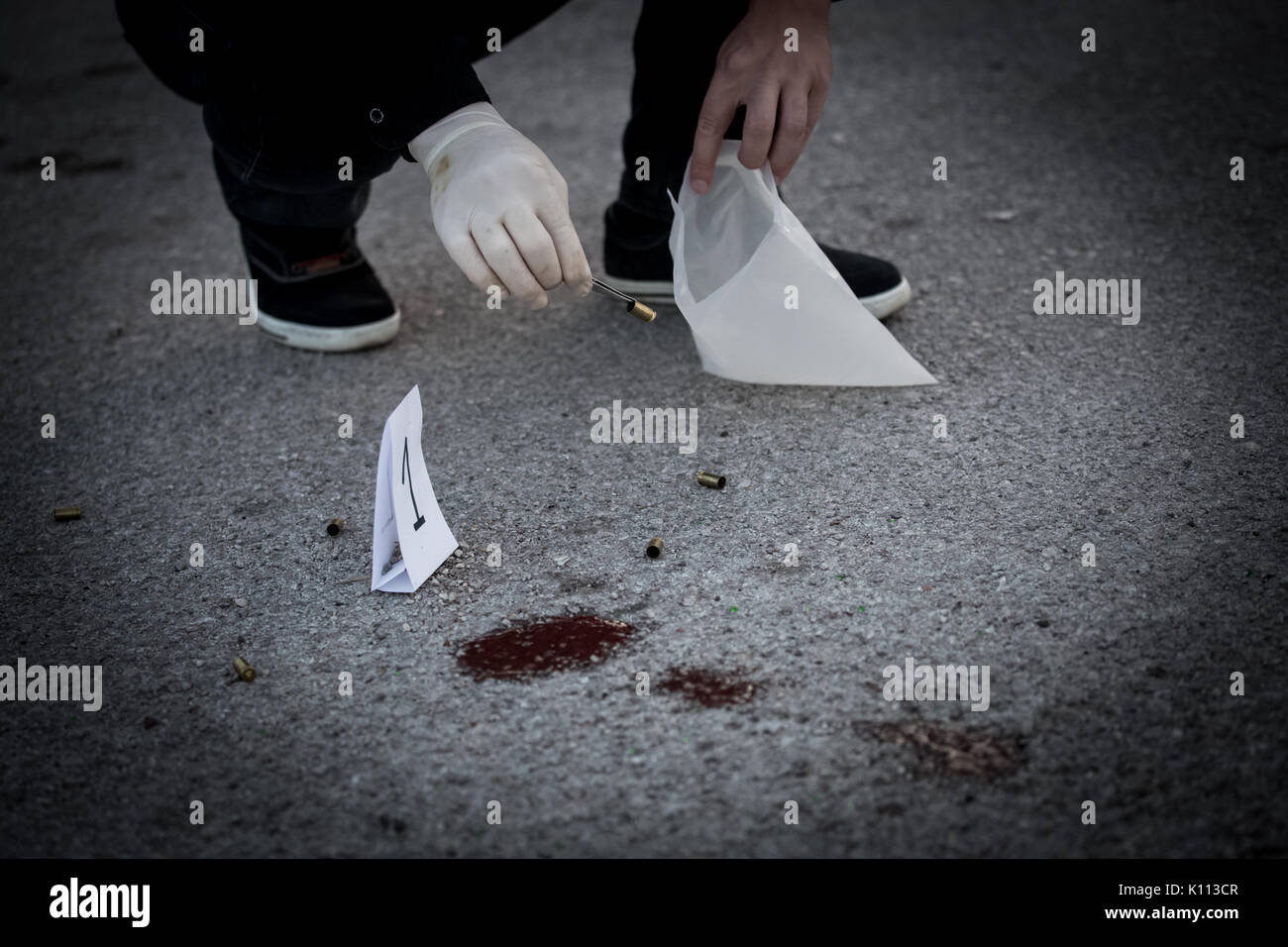 The crime scene, murder, investigation, sleeves shots serve as evidence ...