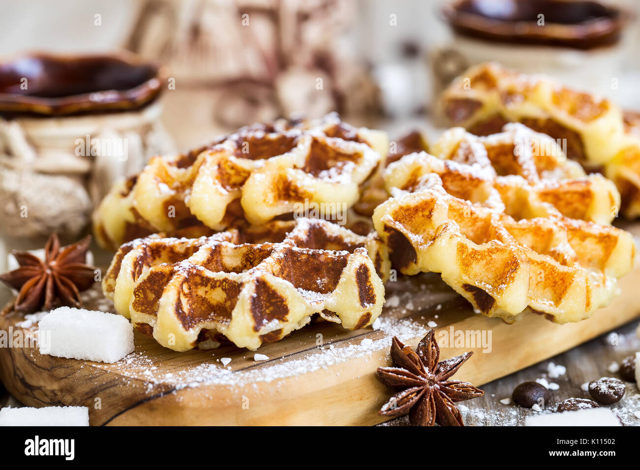 Homemade liege belgian waffers with sugar pearls and coffee on old ...