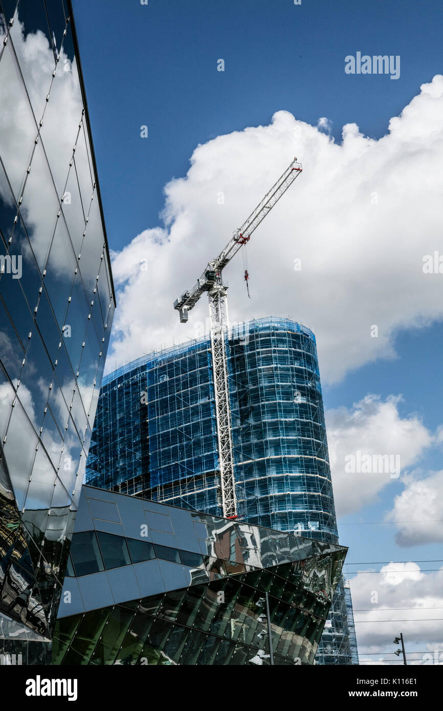 Cranes Building skyscapers Stock Photo - Alamy