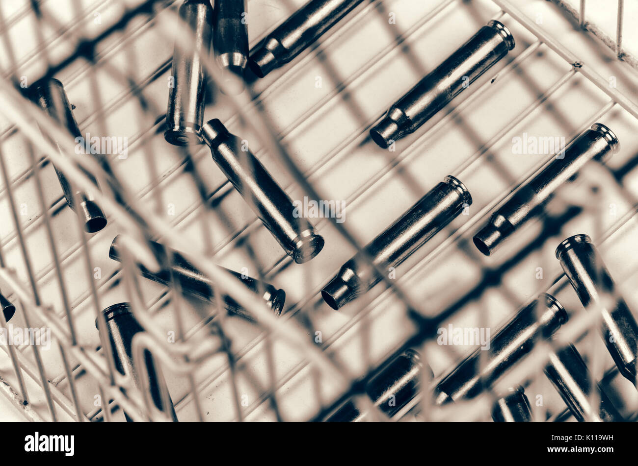 Bullets inside a cage, a concept on gun violence Stock Photo - Alamy