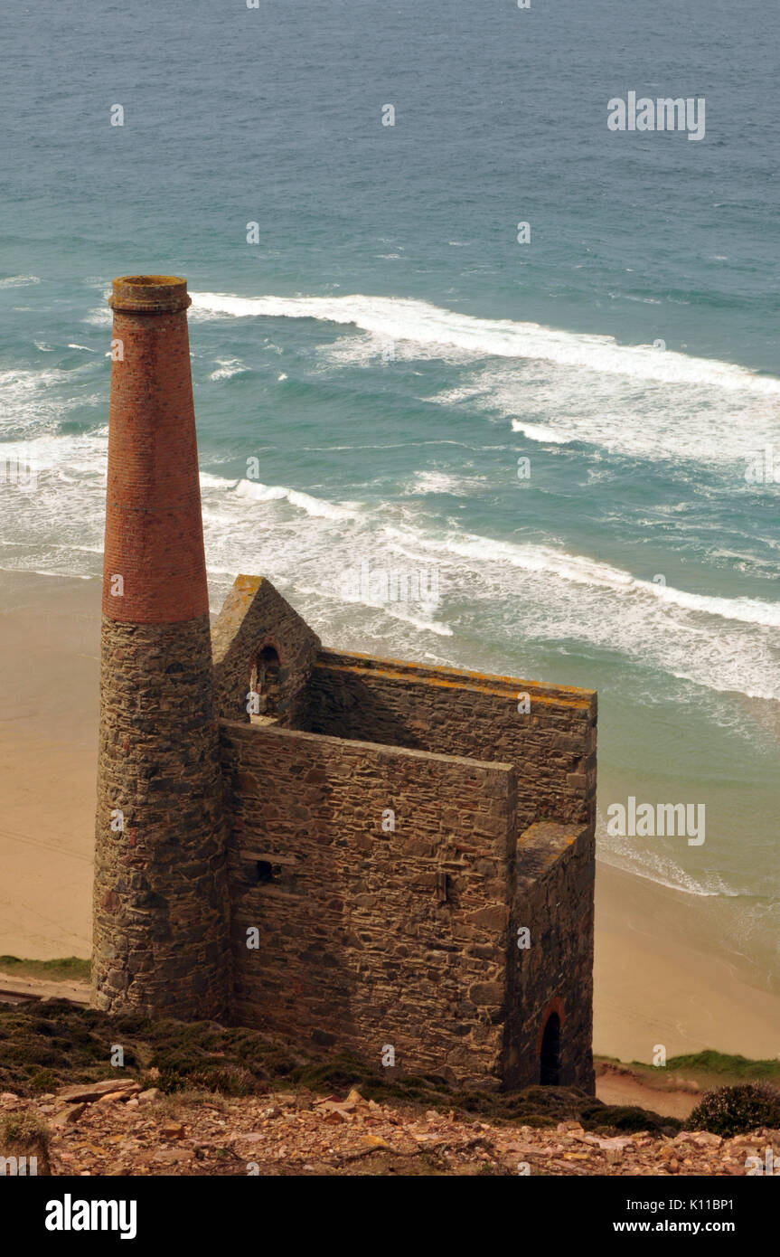 a Cornish tin mine from the 18th century engine houses and chimneys at ...