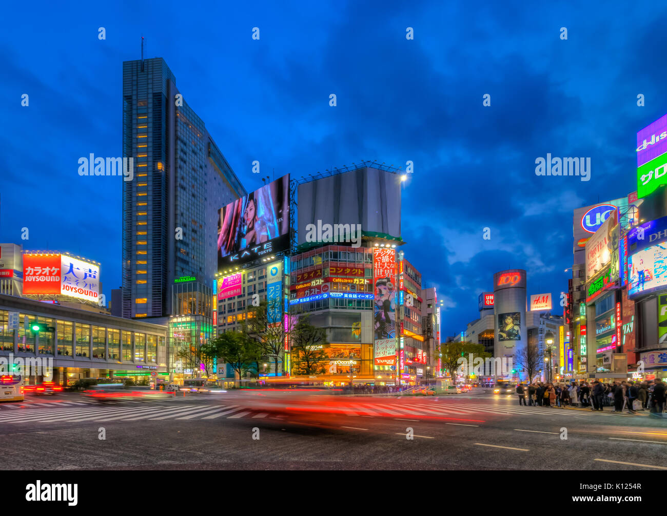 Shibuya crossing at night in the Shibuya district of Tokyo, Japan, Asia ...