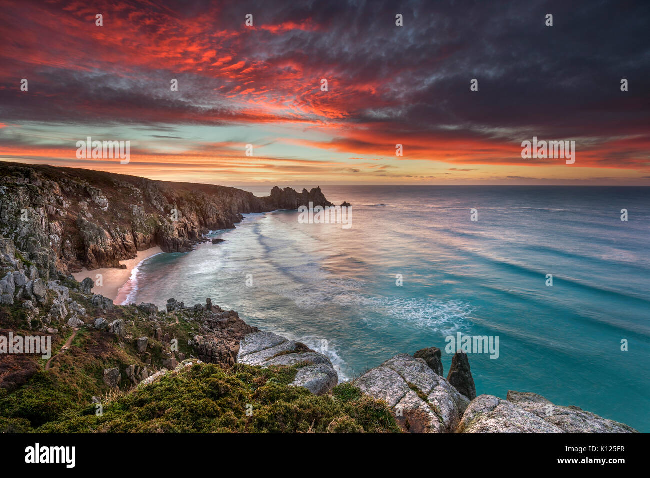 Logan Rock; Sunrise; Porthcurno; Cornwall; UK Stock Photo - Alamy