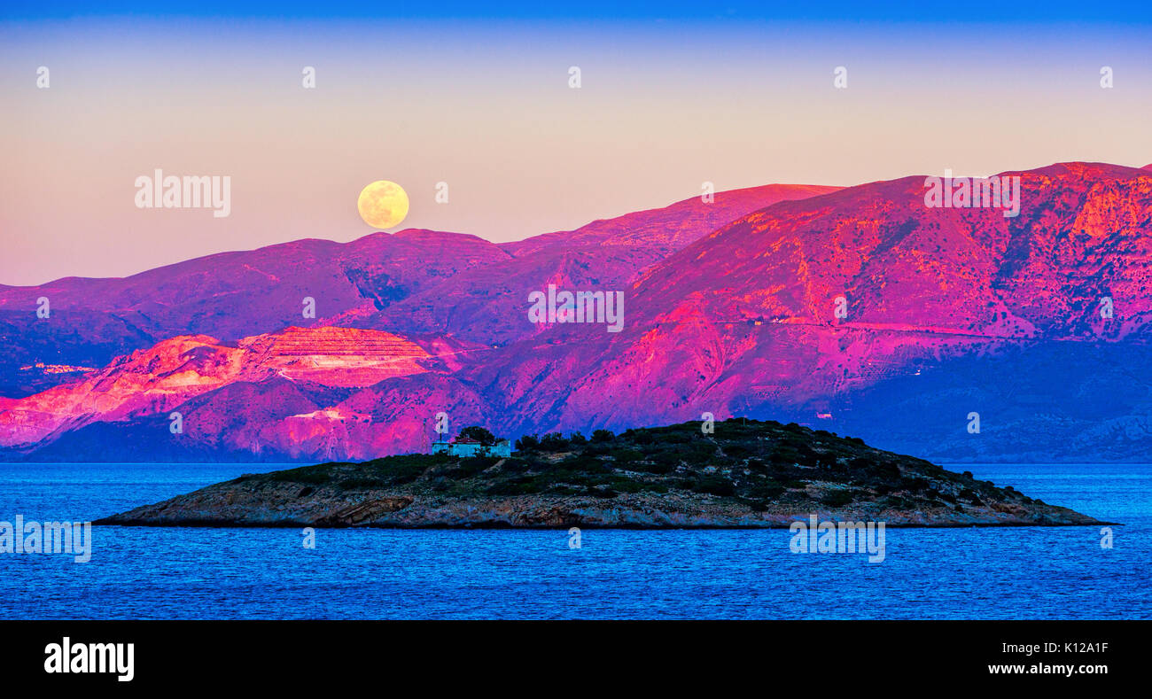 Full moon over the island of Crete at sunset, Mirabello Bay, Crete ...