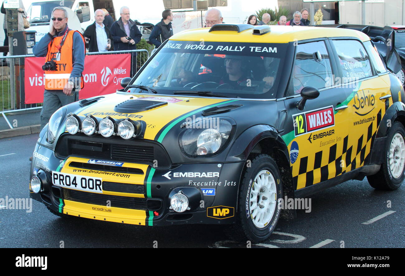 Rally cars on the seafront in Llandudno Wales at the start of the welsh ...