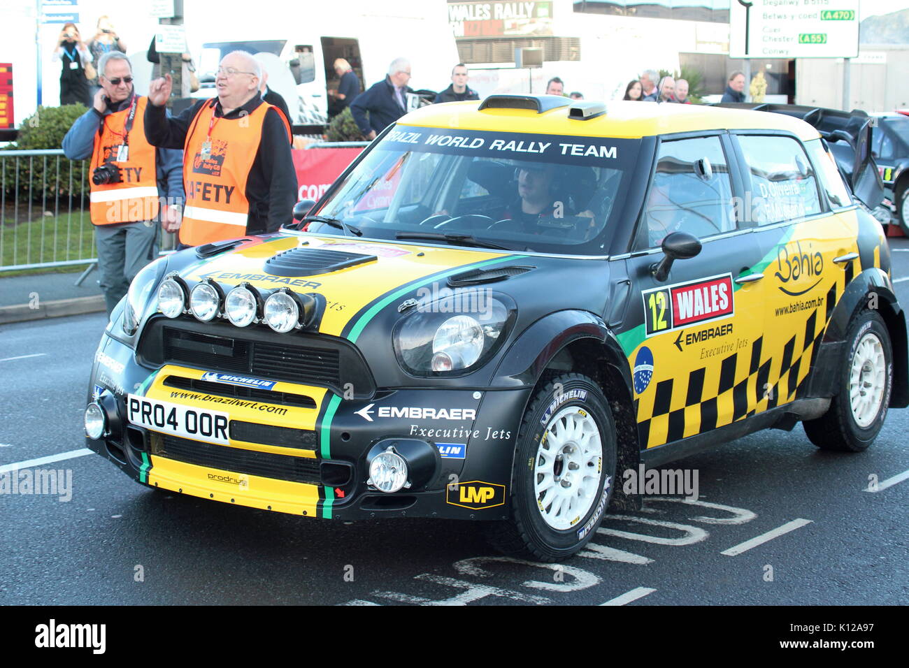 Rally cars on the seafront in Llandudno Wales at the start of the welsh ...