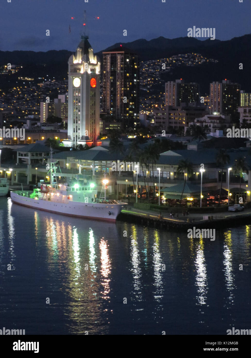 Aloha Tower from ship at night Stock Photo - Alamy