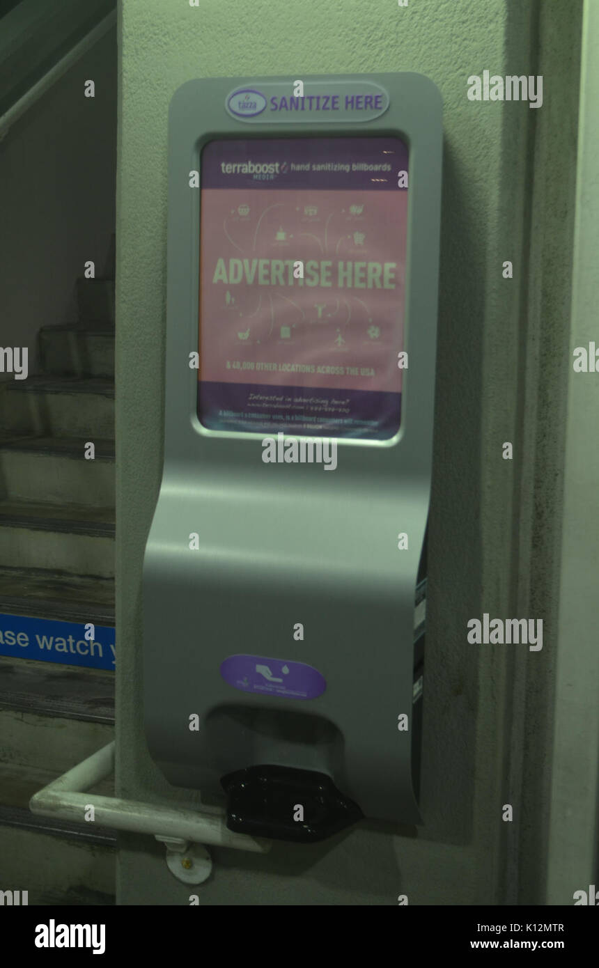 Antibacterial dispenser Miami Metromover Stock Photo - Alamy