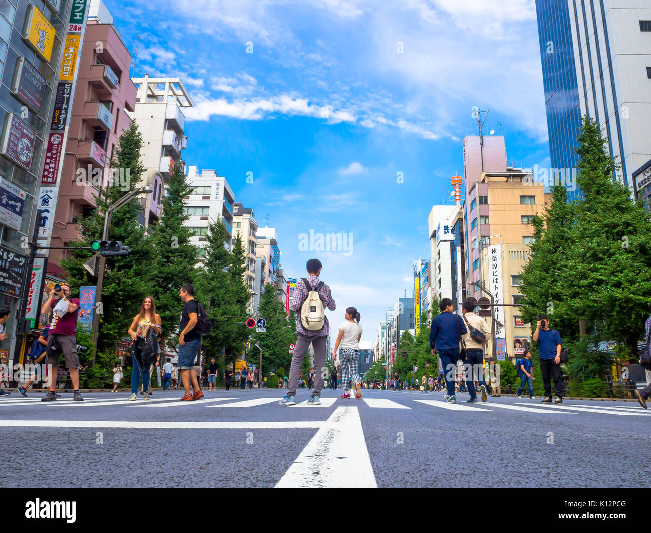 TOKYO, JAPAN -28 JUN 2017: Unidentified people walking and taking ...