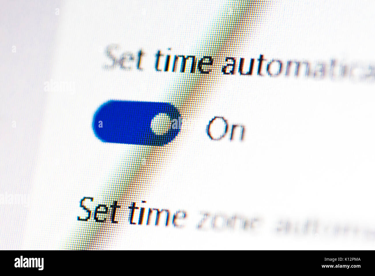 Close up view of computer screen with set time alert button Stock Photo ...