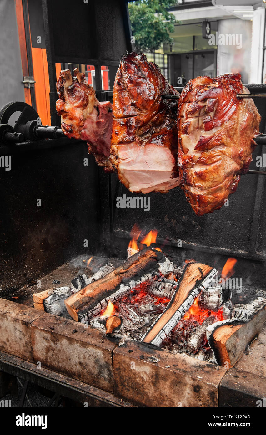 A spit for cooking roast shank in Prague on a Sunny day. National ...