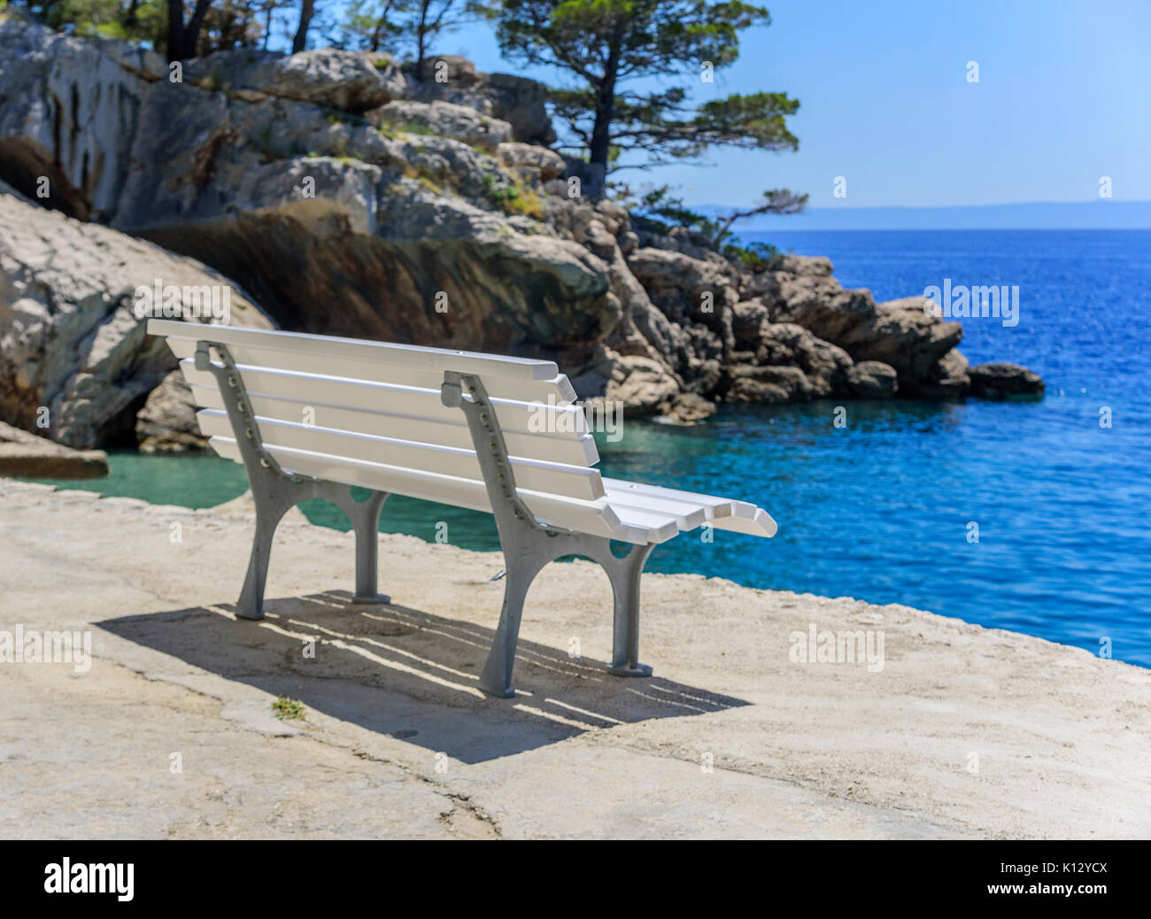 White bench on the waterfront Stock Photo - Alamy