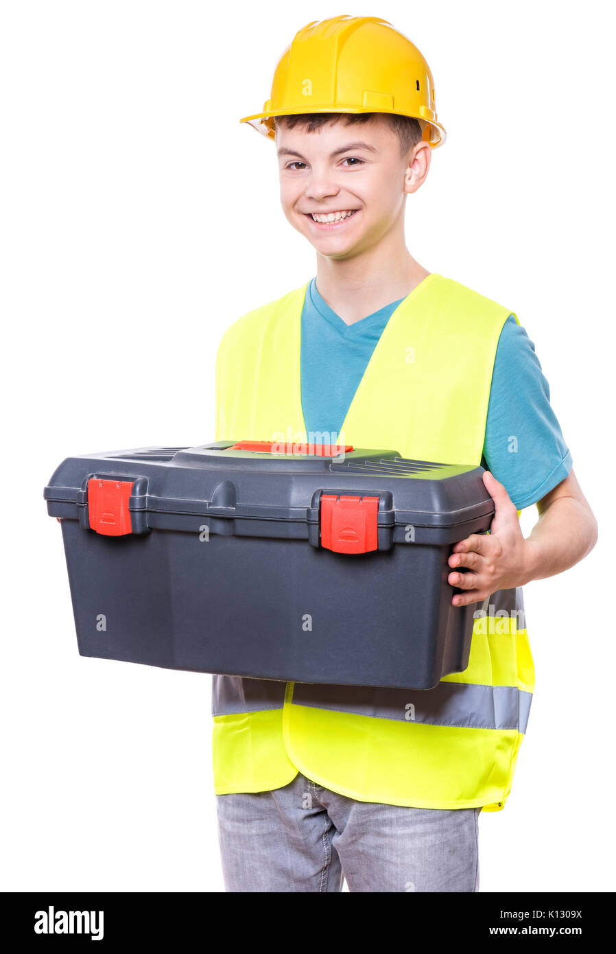 Teen boy in hard hat Stock Photo - Alamy