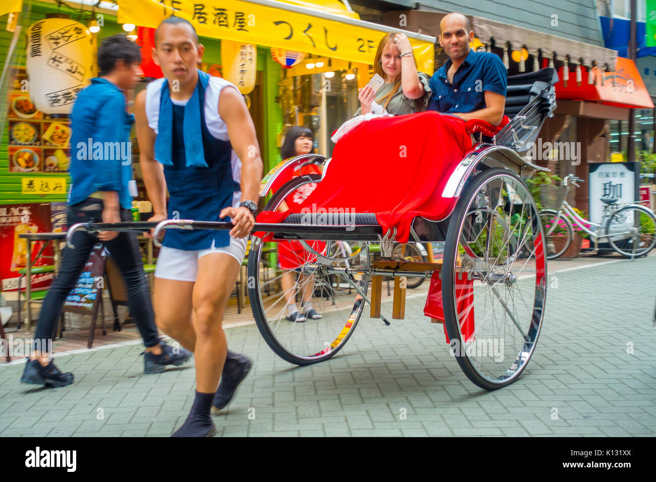 Human pulling rickshaw hi-res stock photography and images - Alamy