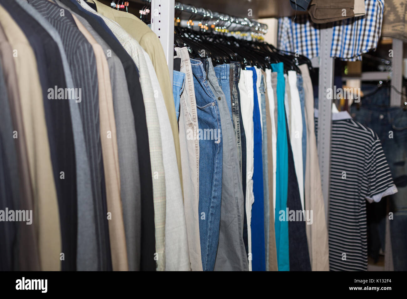 Hanging from hangers hi-res stock photography and images - Alamy