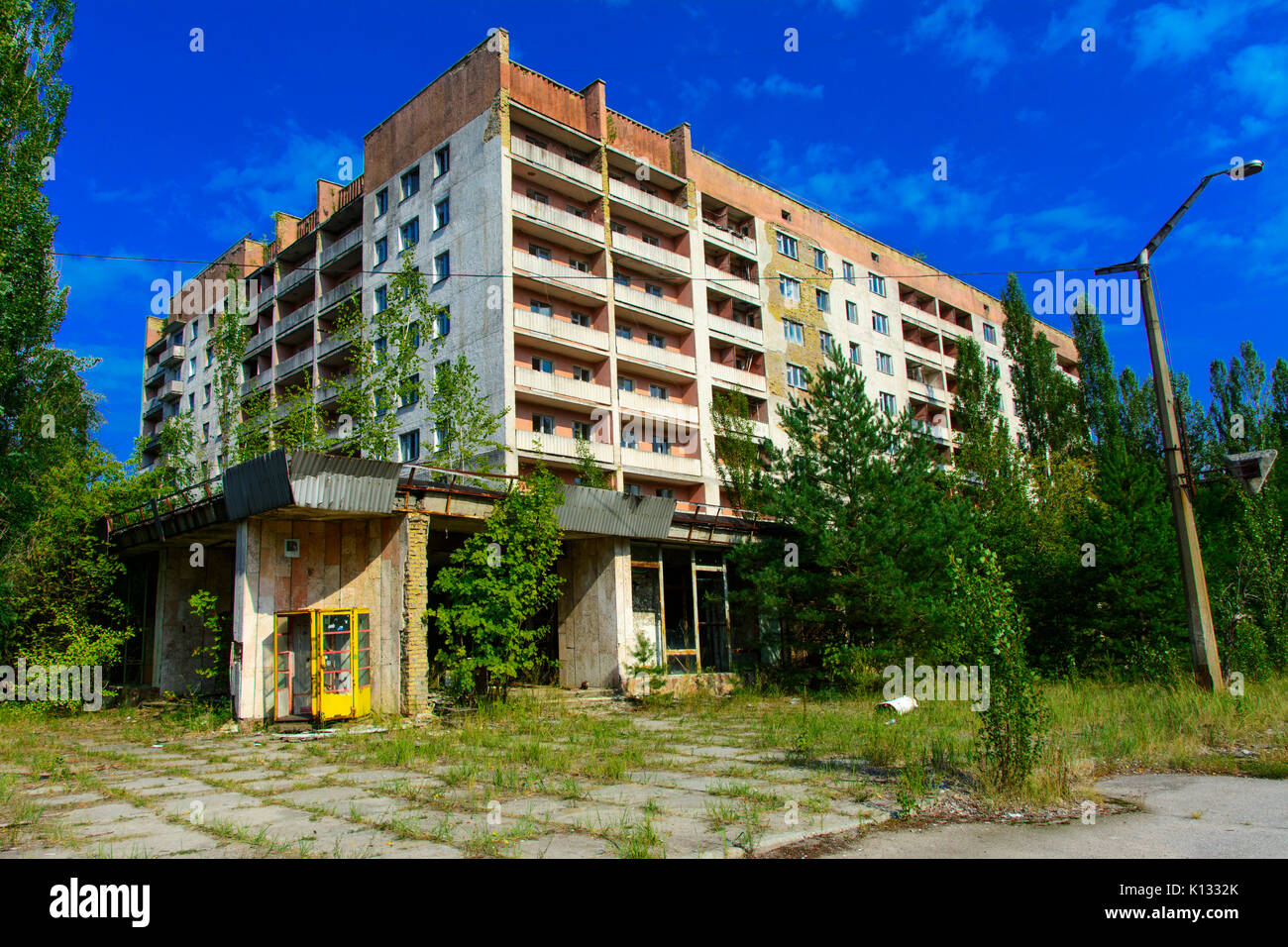 Old abandoned high-rise buildings in a dead radioactive zone. Looting ...