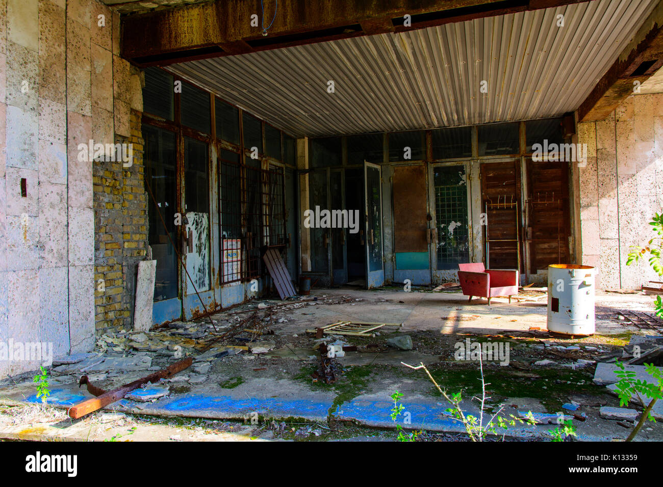Old abandoned high-rise buildings in a dead radioactive zone. Looting ...