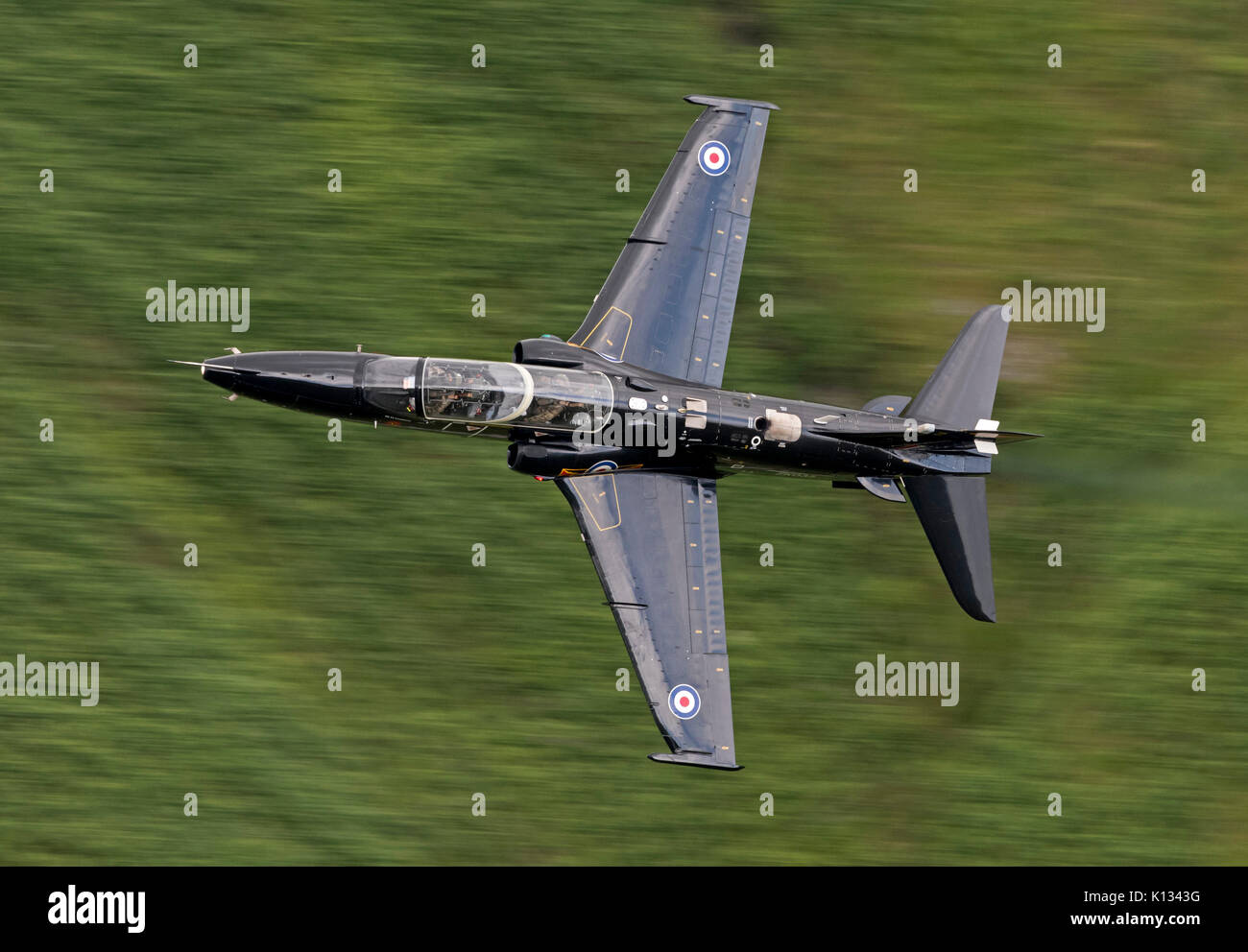 RAF Hawk T2 Aircraft flying low level in Wales Stock Photo - Alamy