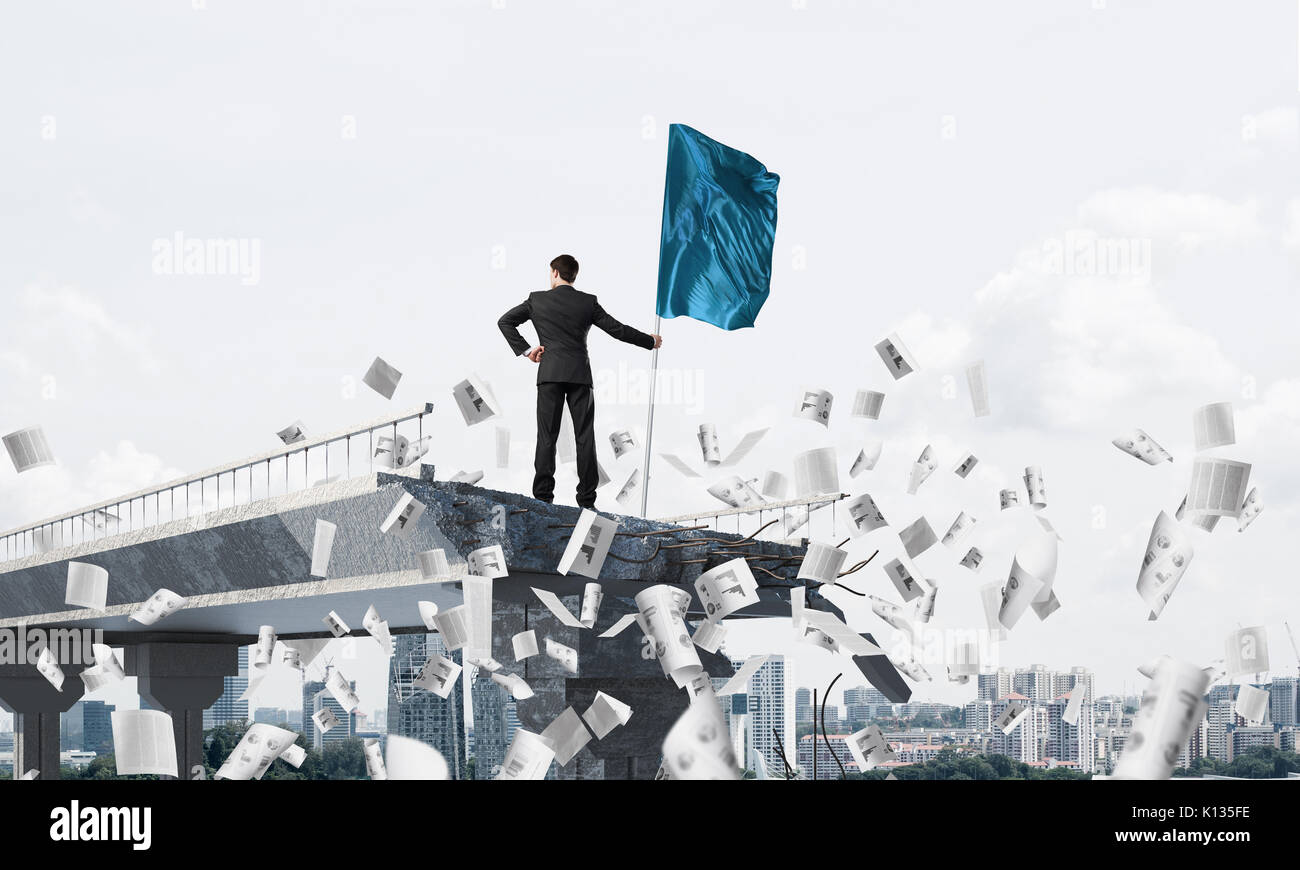 Man with flag presenting leadership concept Stock Photo - Alamy