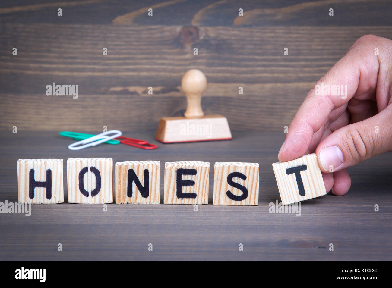 Honest from wooden letters on wooden background Stock Photo - Alamy