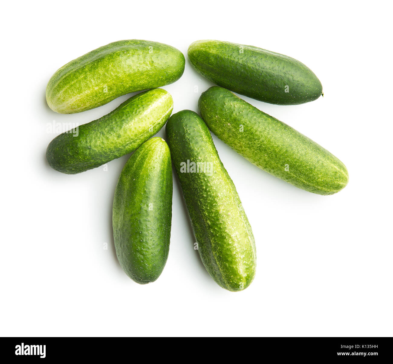 Fresh green cucumbers isolated on white background. Top view of ...