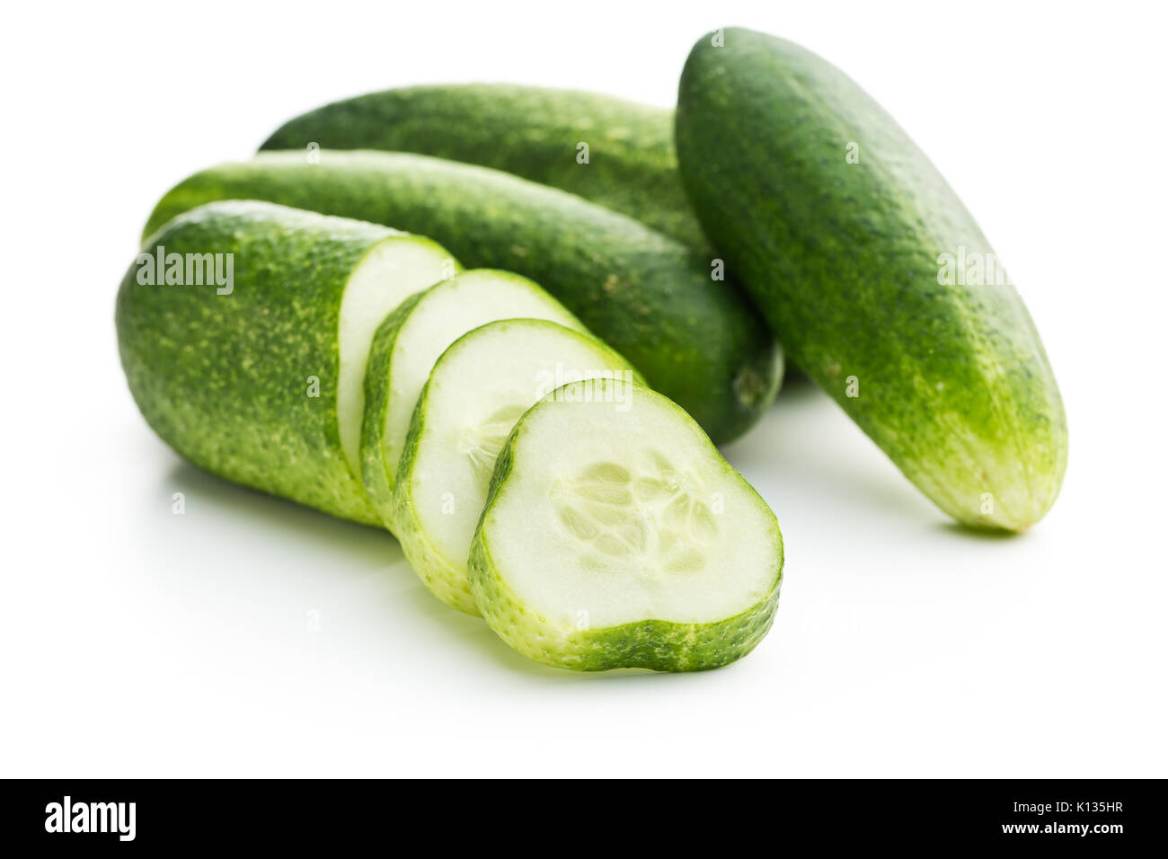 Fresh sliced cucumber isolated on white background. One sliced cucumber ...