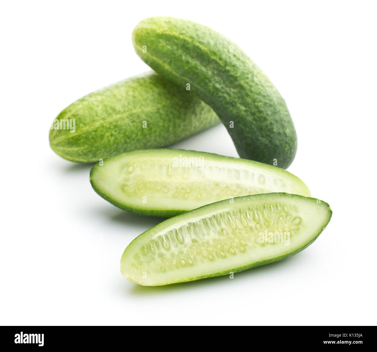 Fresh sliced cucumber isolated on white background. One sliced cucumber ...