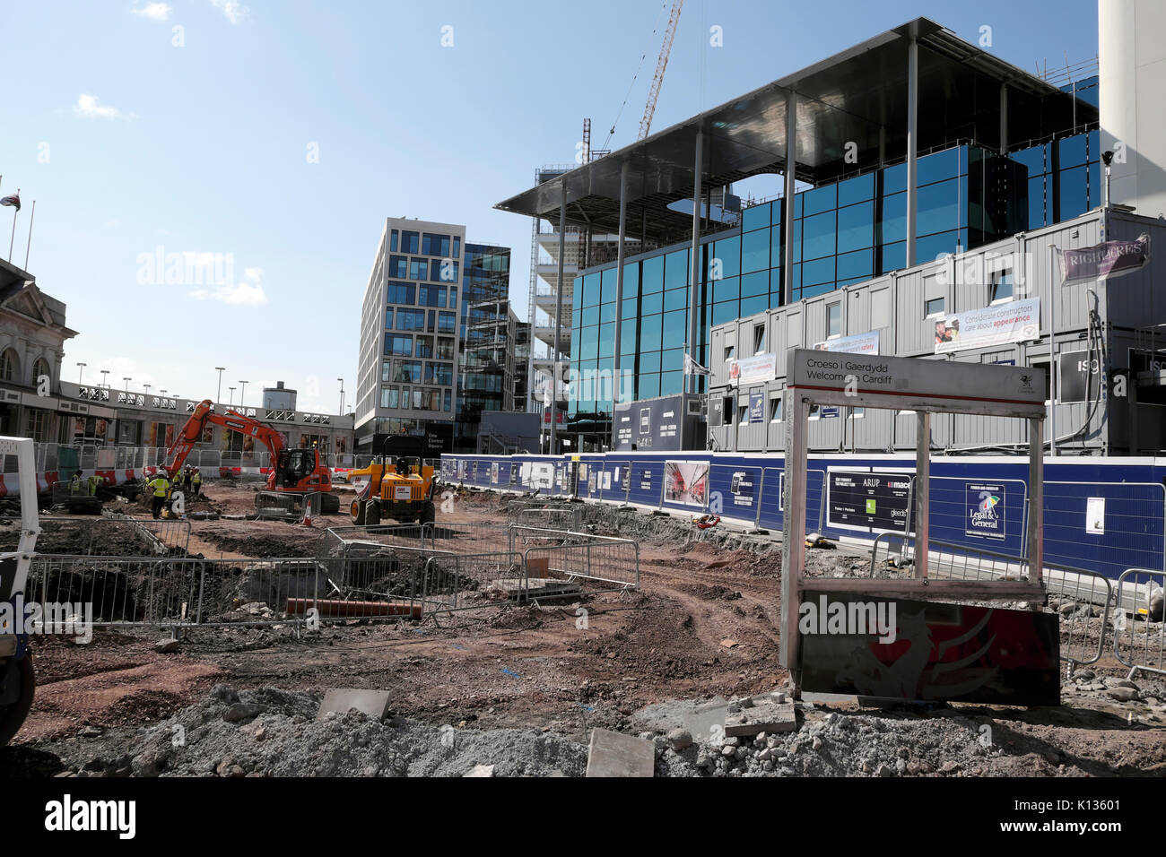 Builders working on plaza redevelopment area outside Cardiff Central ...