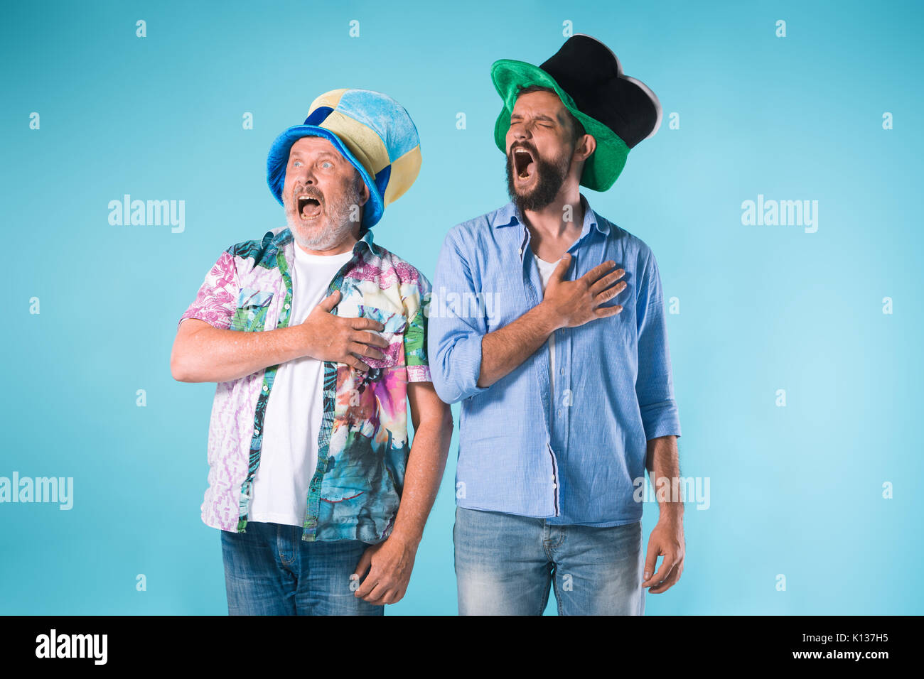 Football fans singing hi-res stock photography and images - Alamy