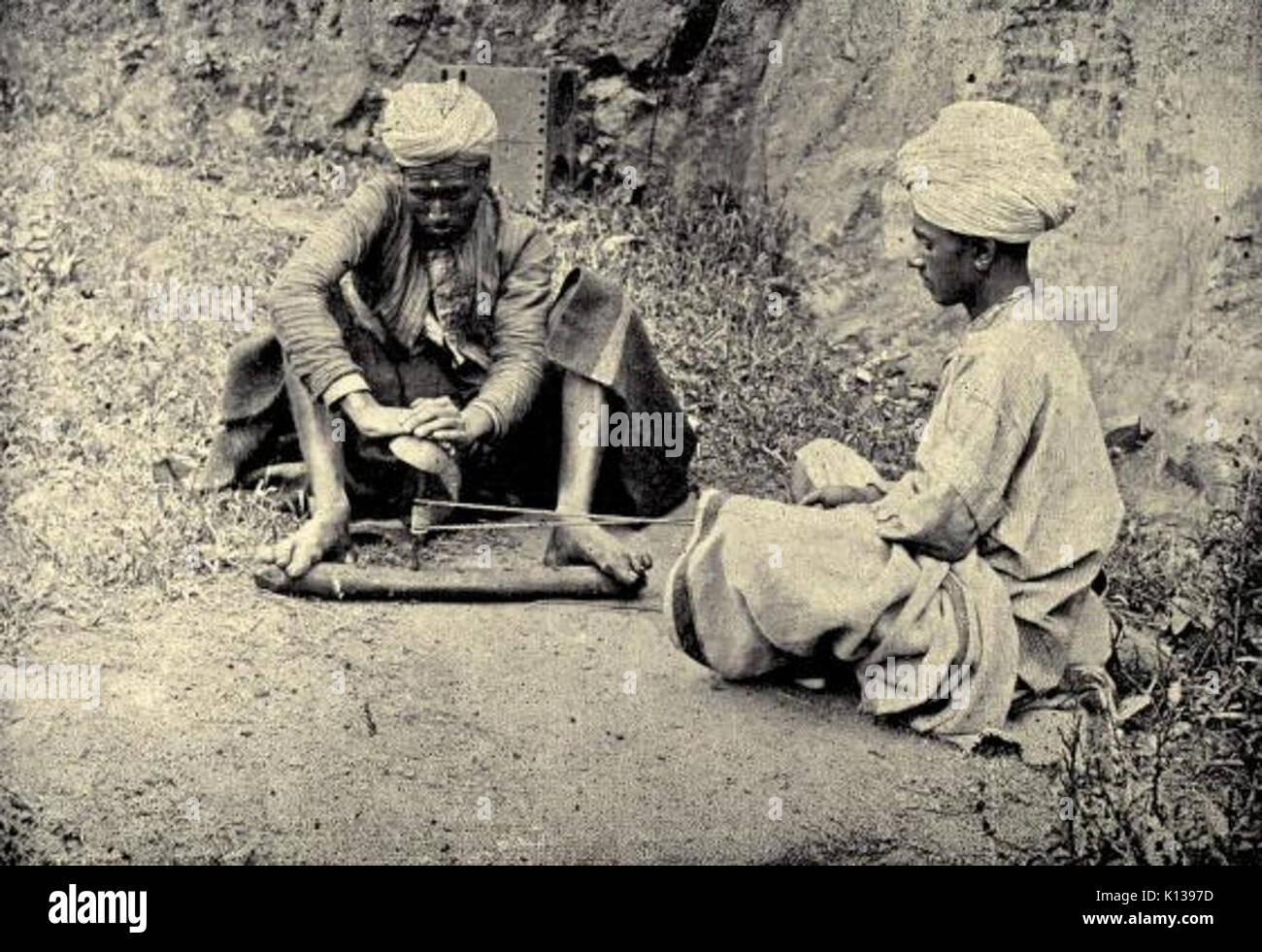 Badagas making fire Stock Photo - Alamy