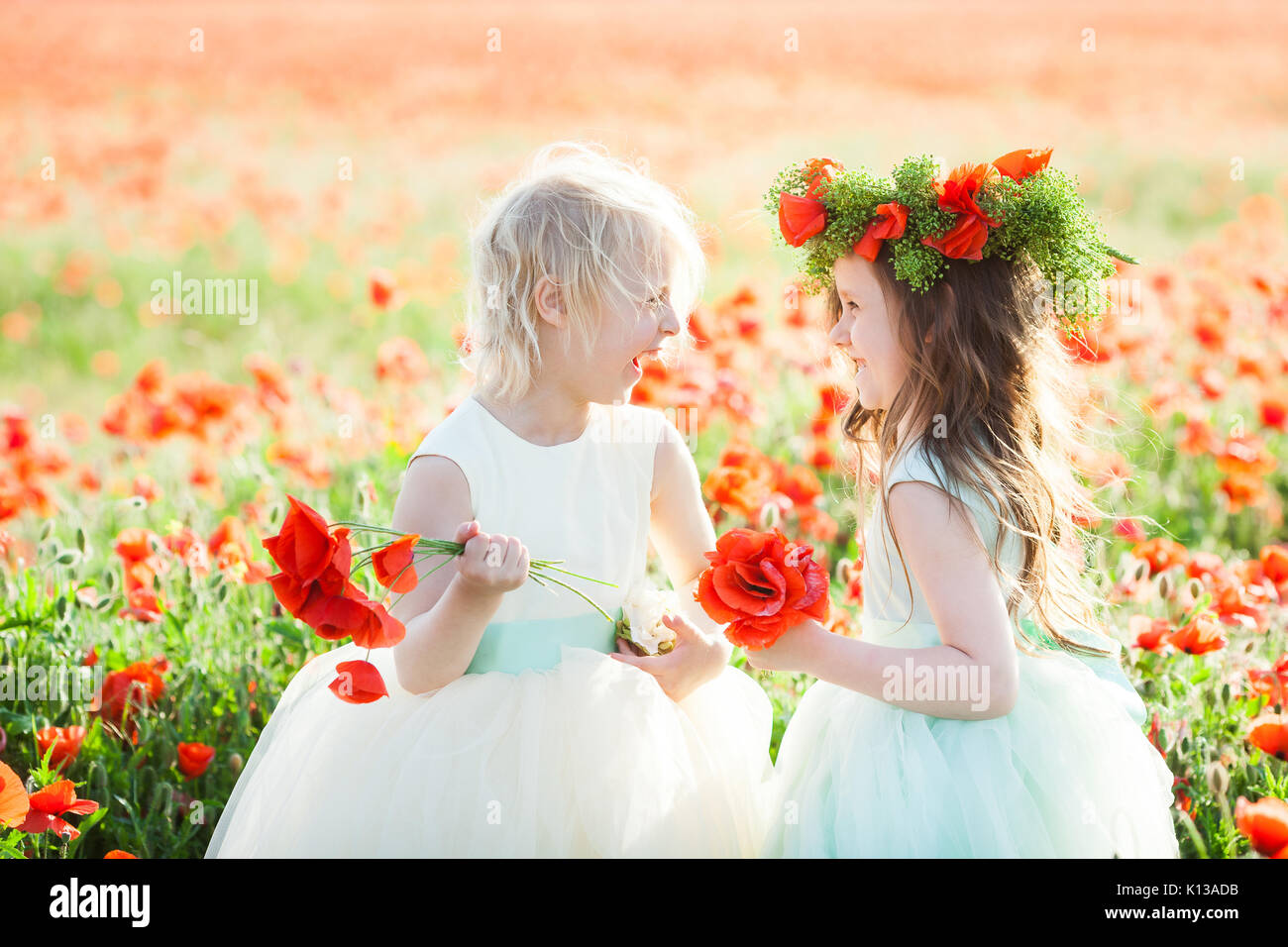 friendship, family, communication, holidays concept - two cute girls ... friendship, family, communication, holidays concept - two cute girls ...