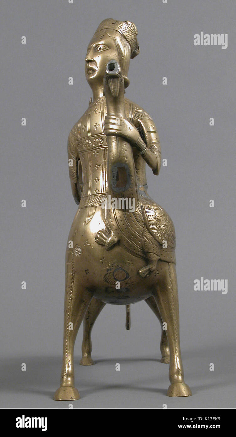 This aquamanile, depicting a crowned centaur battling a dragon, is a ...