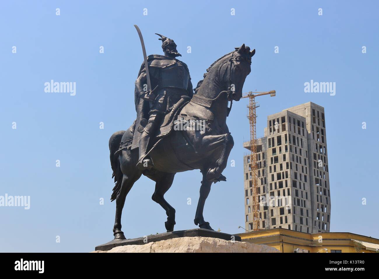 Statue of Skanderbeg or Gjergj Kastrioti and 4 Evergreen Tower under ...