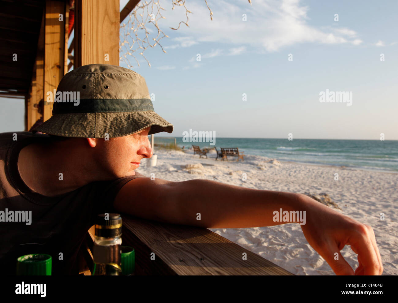 Man at seaside table hi-res stock photography and images - Alamy