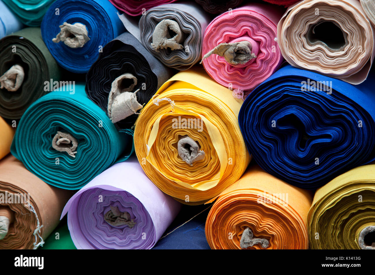 colourful fabric rolls on a street market Stock Photo - Alamy