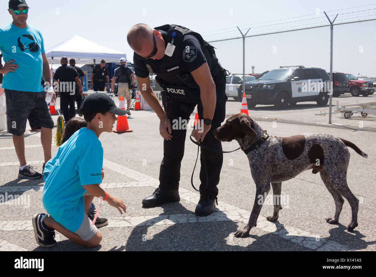 August 19, 2017 - A Long Beach Police K9 Handler and his dog interact ...