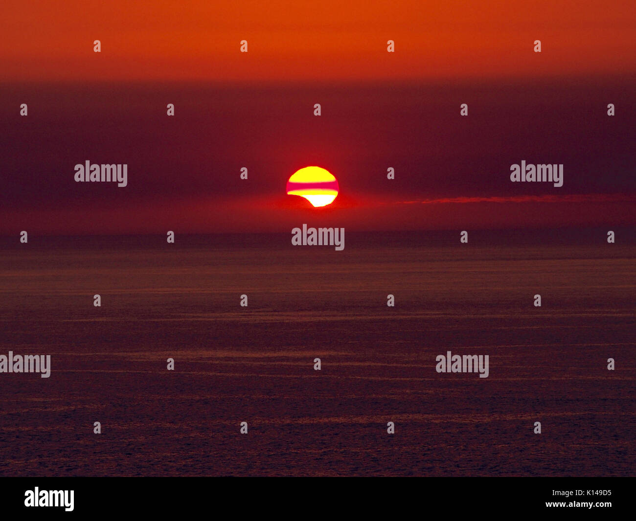 Partial eclipse sunset hi-res stock photography and images - Alamy