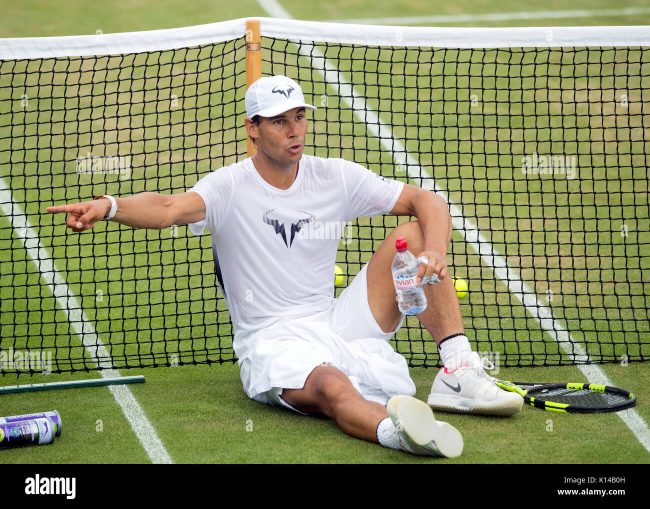 Rafa Nadal of Spain takes a break during practice at the Wimbledon ...