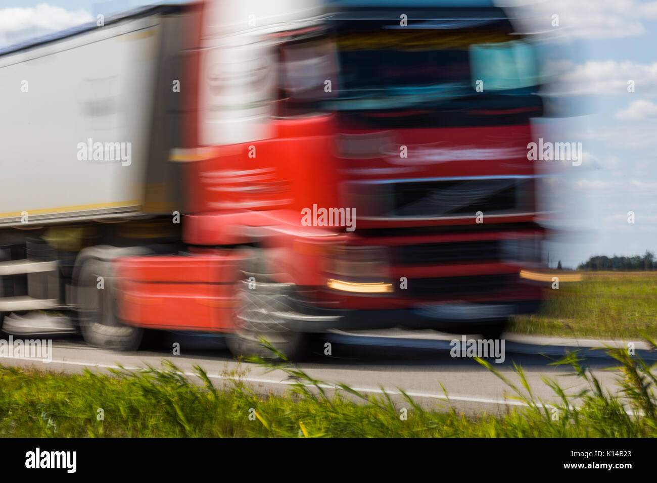 Truck transport on the road with motion blur. Blurred image background ...