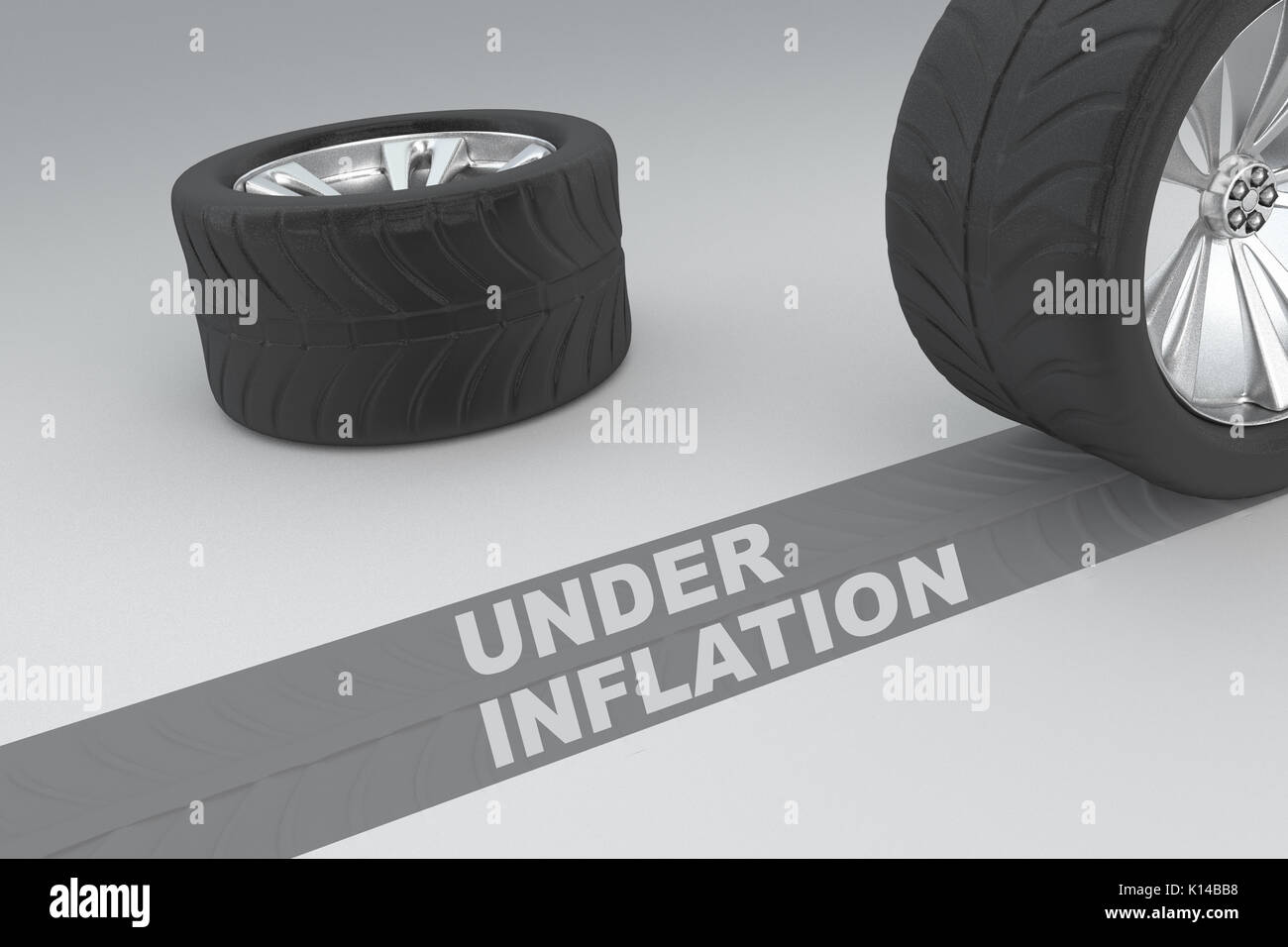 3D illustration of "UNDER INFLATION" title with two tires as a ...