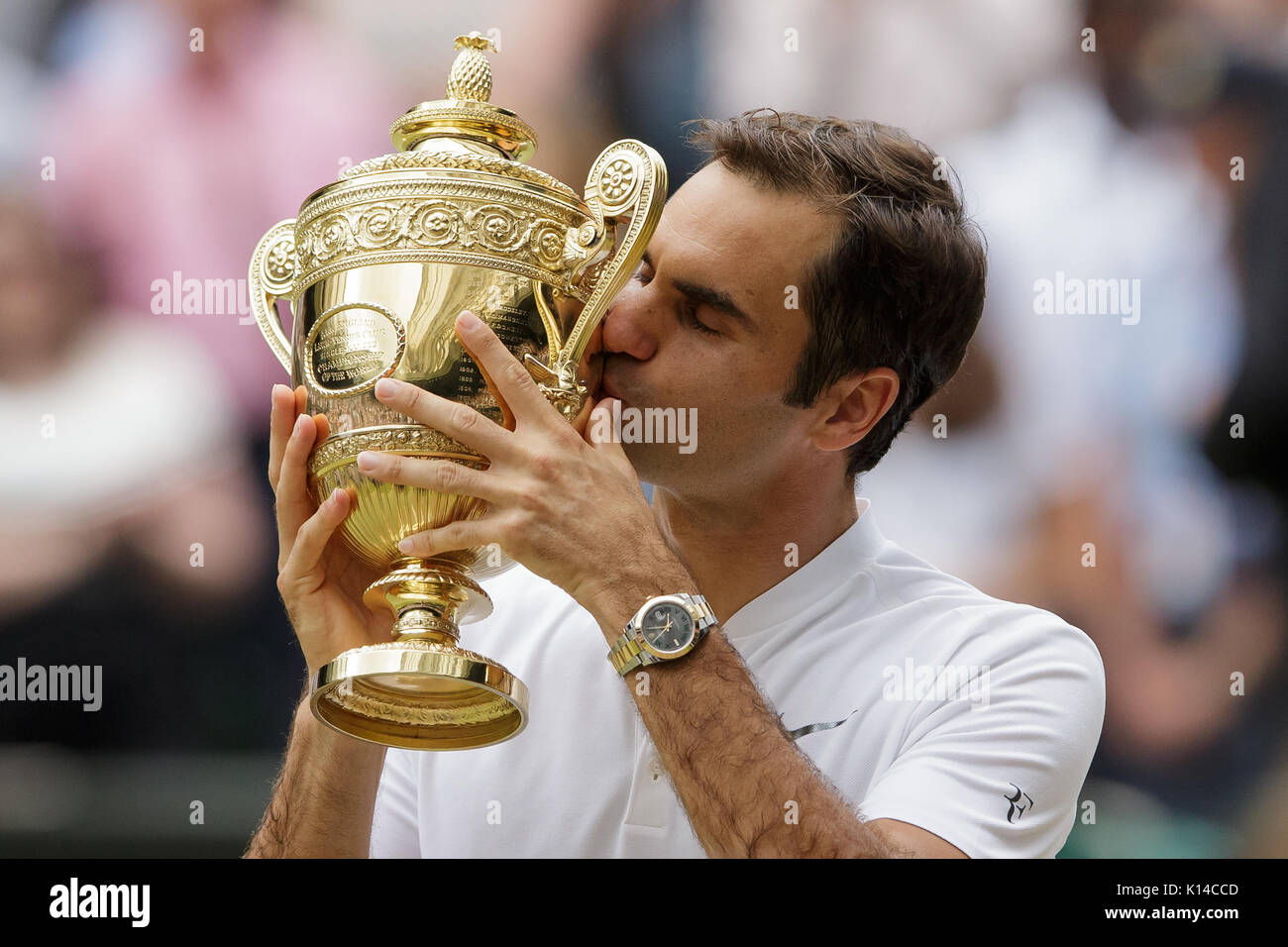 Roger Federer of Switzerland with his trophy after the Gentlemen's ...